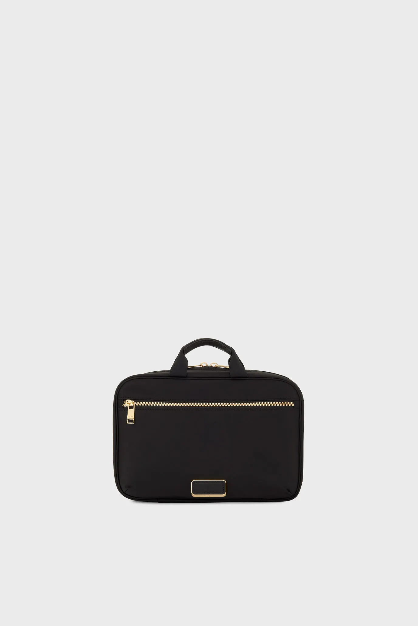 Женская черная косметичка VOYAGEUR Tumi 0196627DGLD — MD-Fashion